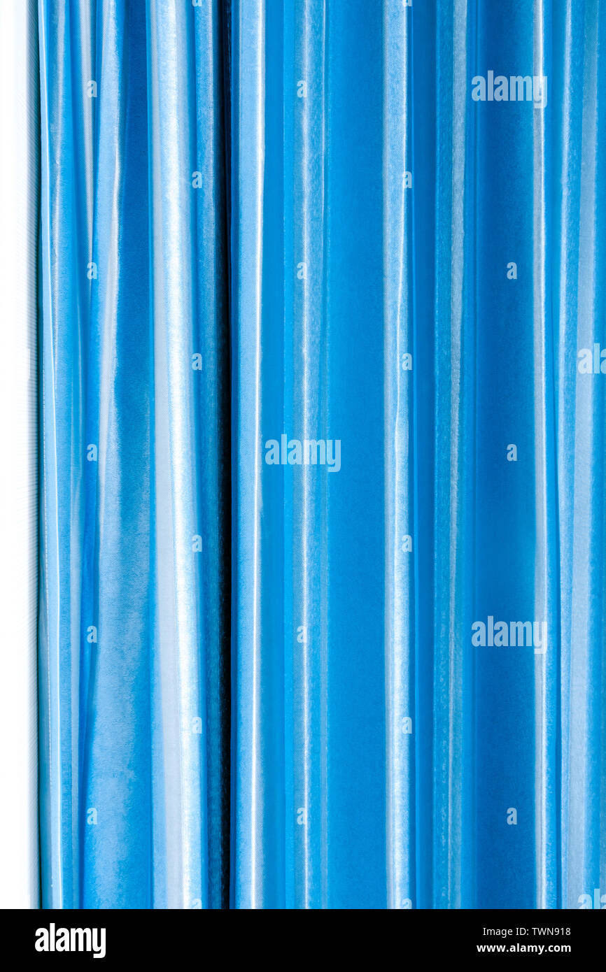 Bright and shiny blue color of curtain Stock Photo - Alamy