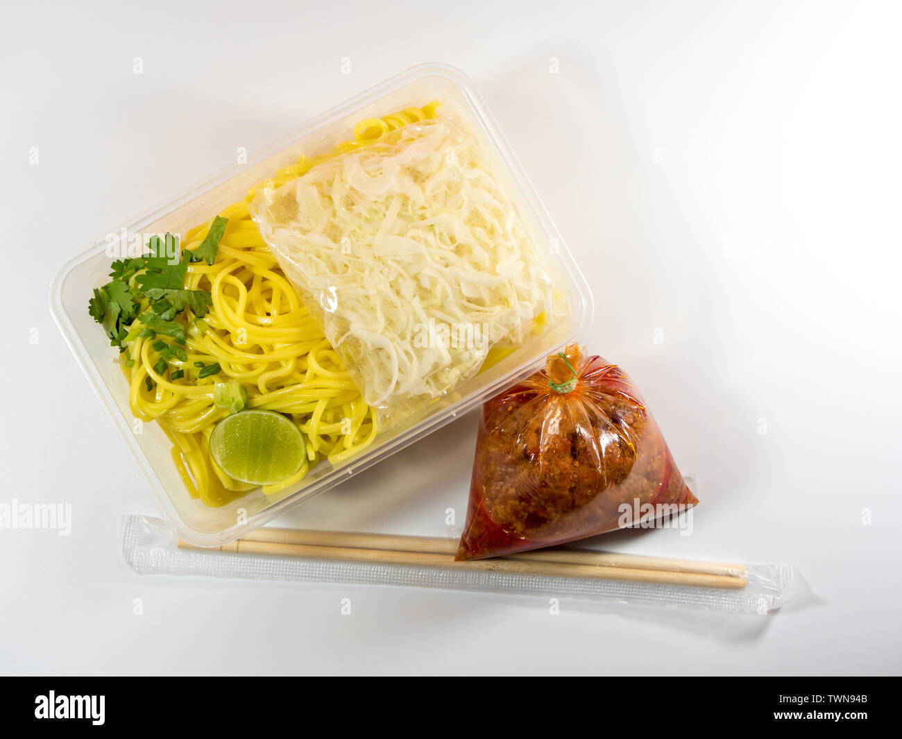Spaghetti with sauce / Take home food in plastic packaging Stock Photo ...