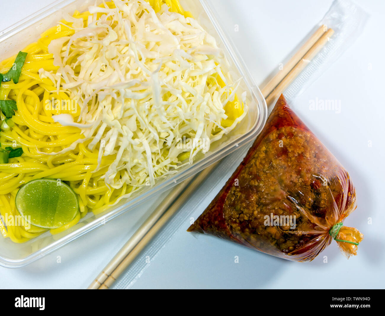 Spaghetti with sauce / Take home food in plastic packaging Stock Photo ...