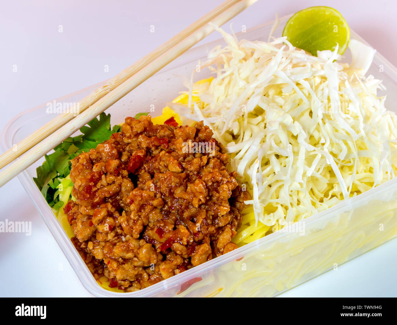 Spaghetti with sauce / Take home food in plastic packaging Stock Photo ...