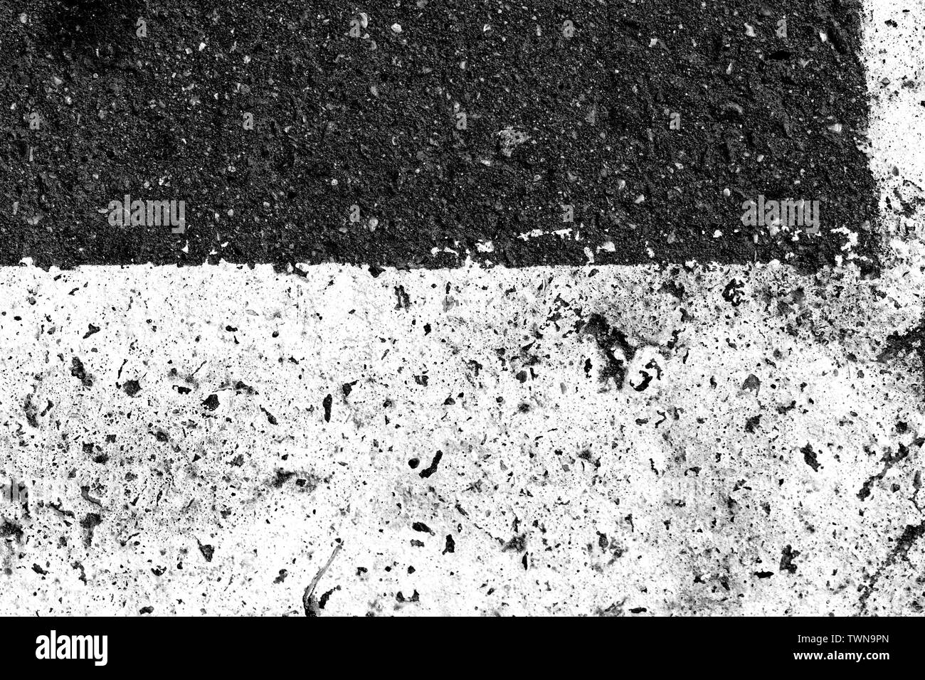 Asphalt surface with old paint on it close up. Abstract background ... Asphalt surface with old paint on it close up. Abstract background ...