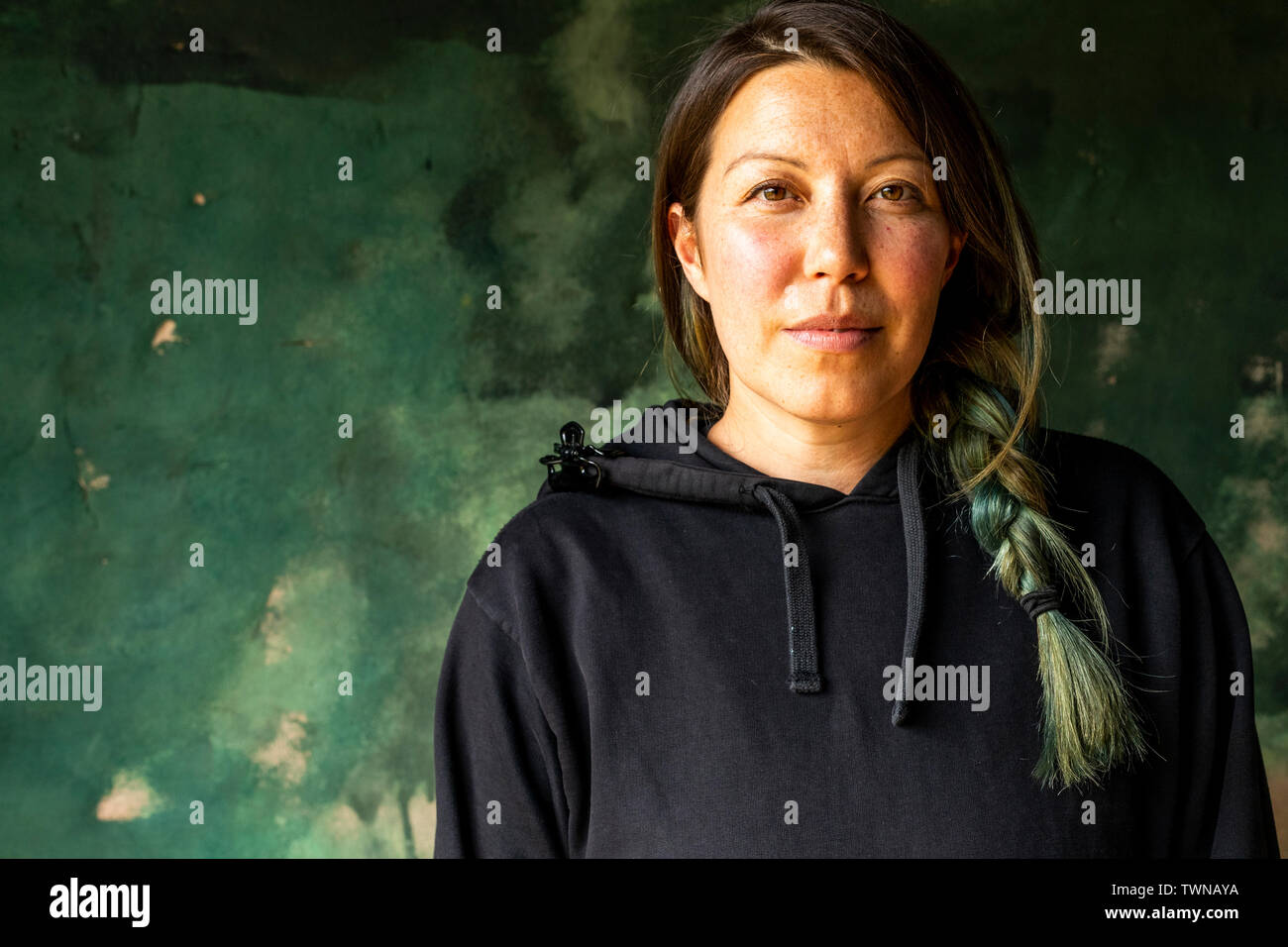 Matilda Tickner-Du. Creation of a large wall mural with a natural ...