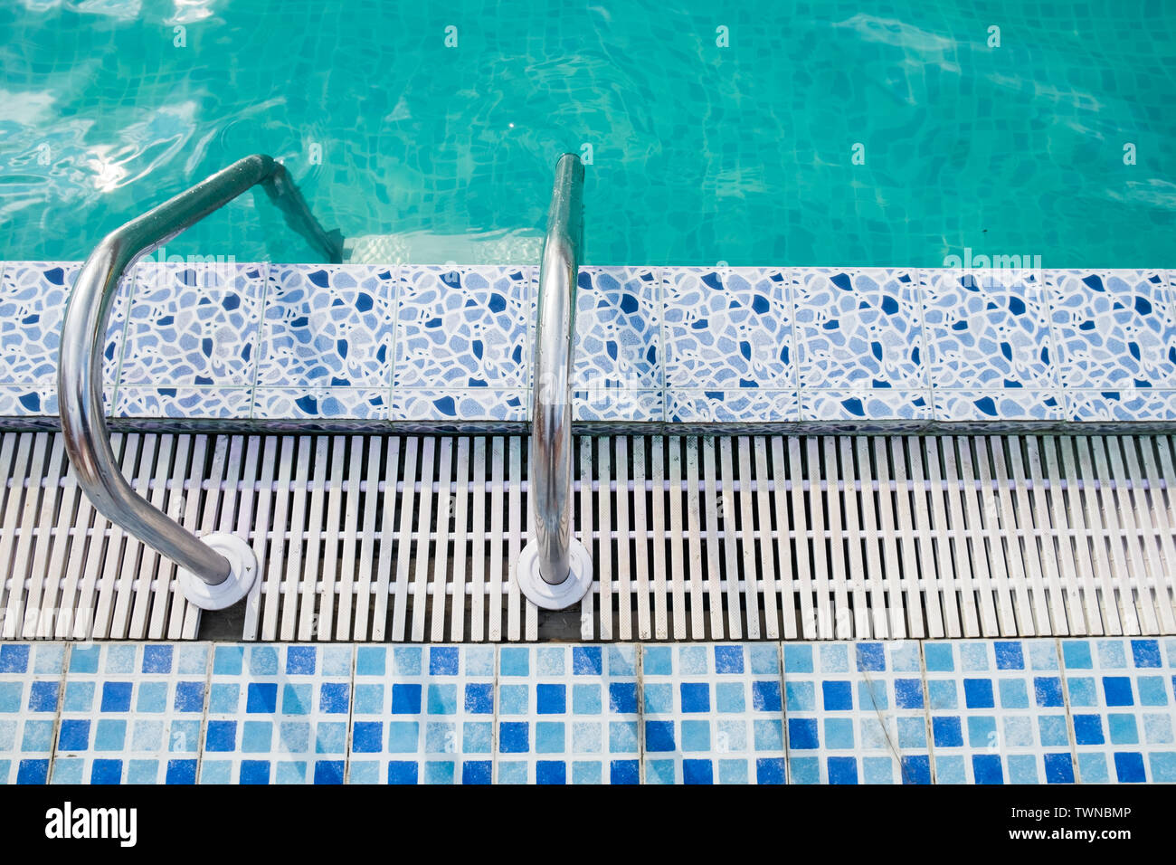railing beside swimming pool at water park,top view Stock Photo - Alamy