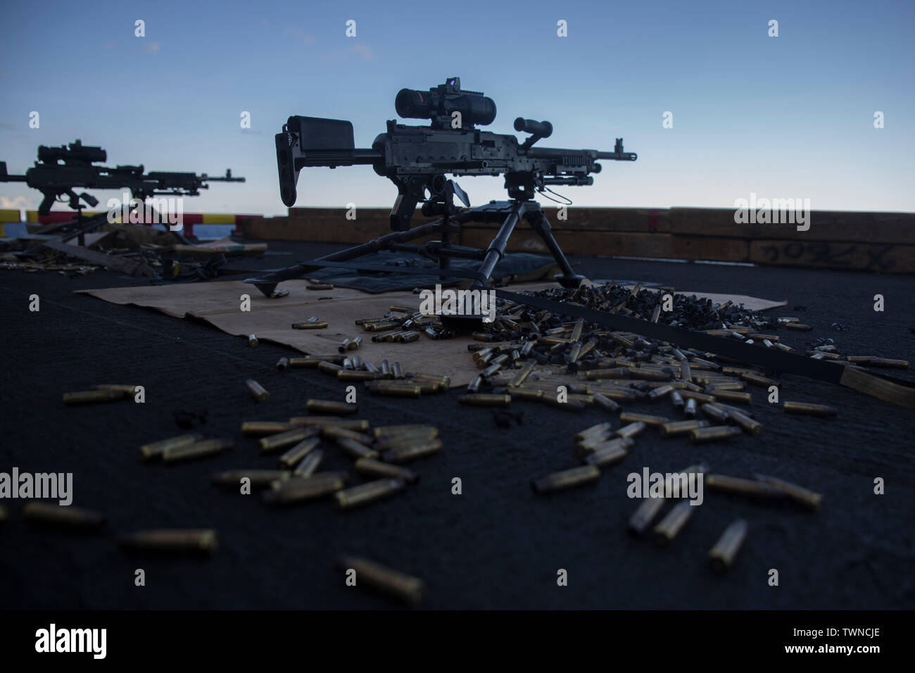 M240B medium machine guns stand by aboard the amphibious assault ship ...