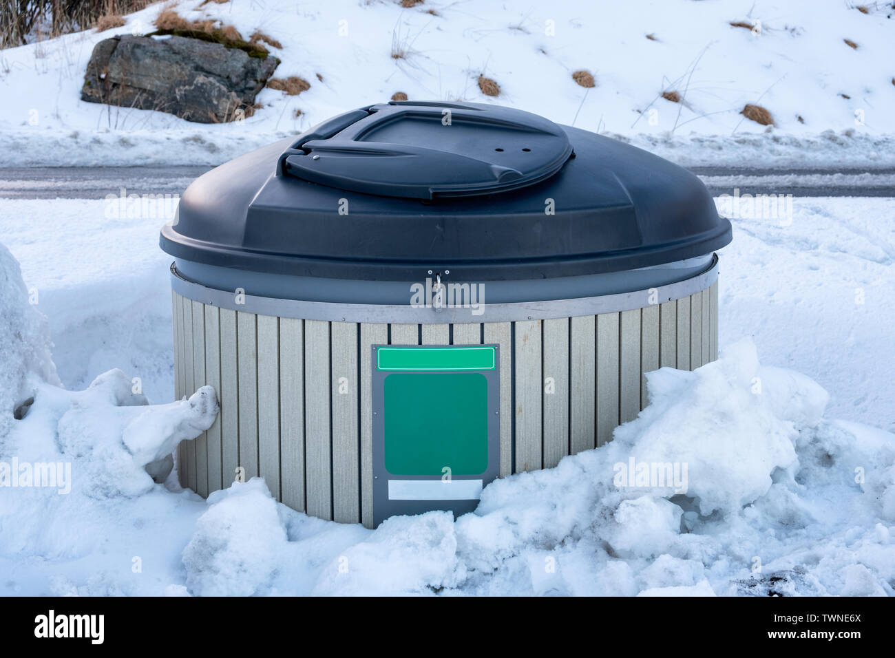 Garbage bin covered with snow hi-res stock photography and images - Alamy