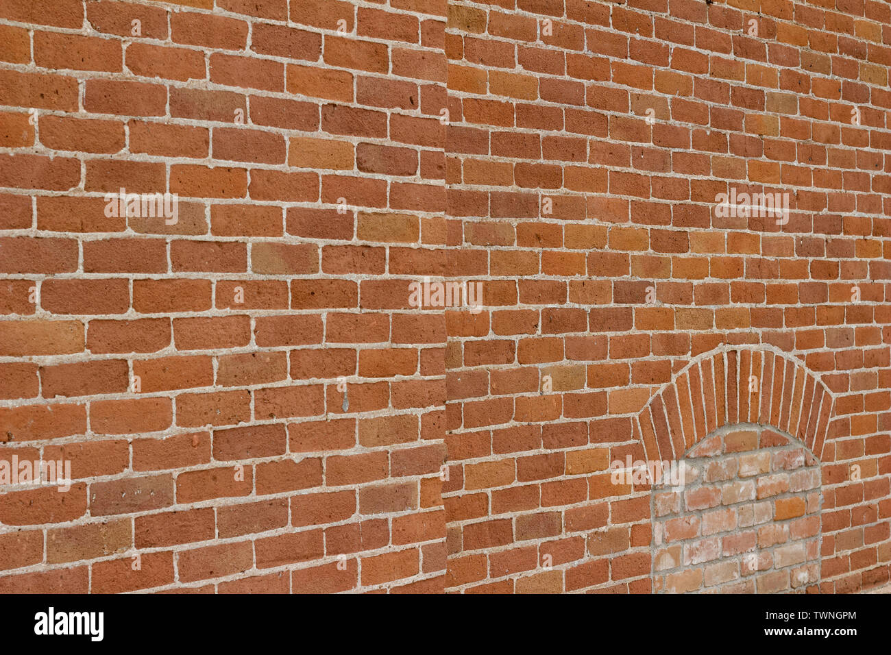 Old 19th Century weathered orange red brick wall background in ...