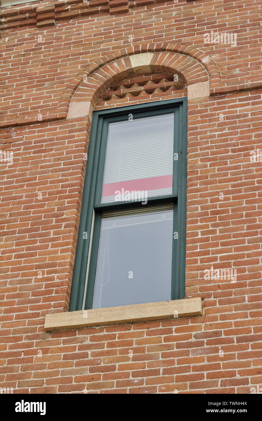 Old 19th Century weathered orange red brick wall background in ...