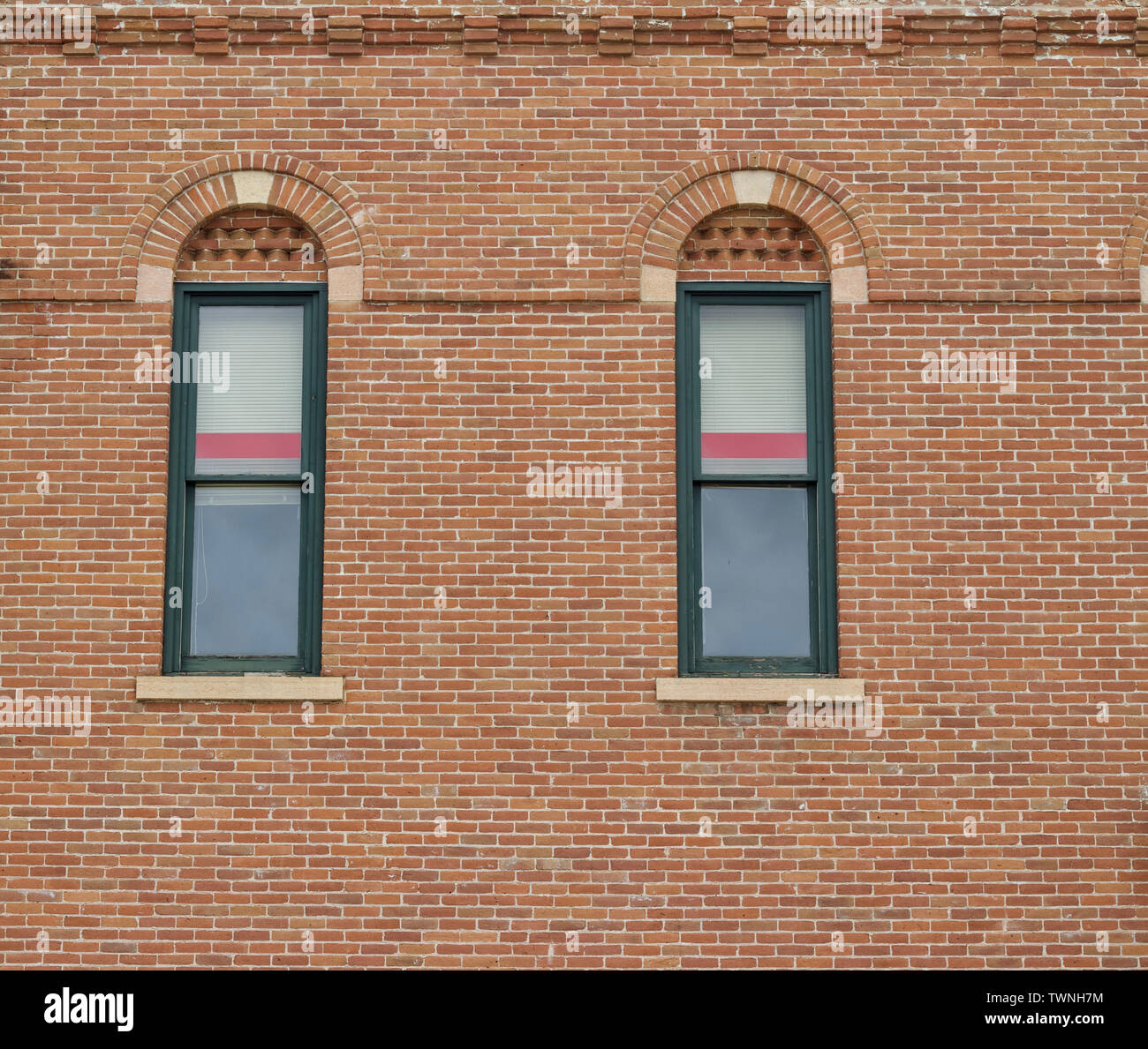 Old 19th Century weathered orange red brick wall background in ...