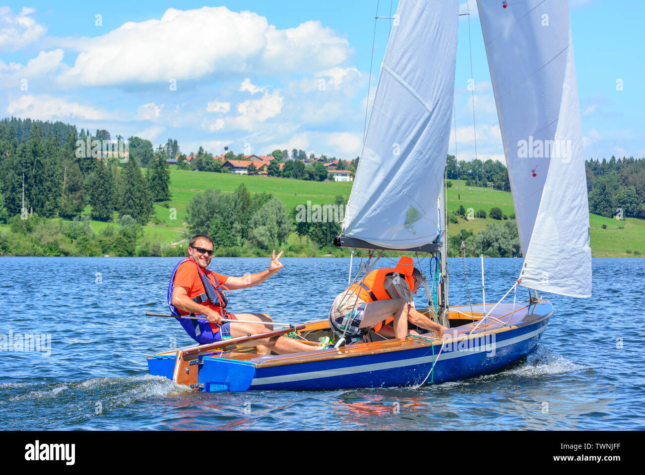 Sailing on inland lake in summertime Stock Photo - Alamy