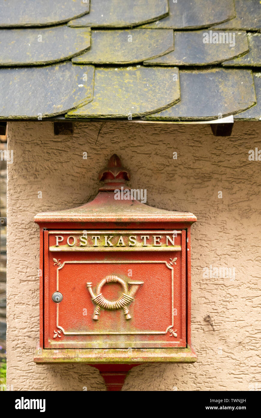old red mailbox in a german village Stock Photo - Alamy