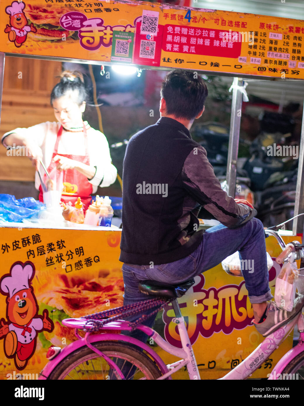 Busy city night life in downtown xiamen, china Stock Photo - Alamy