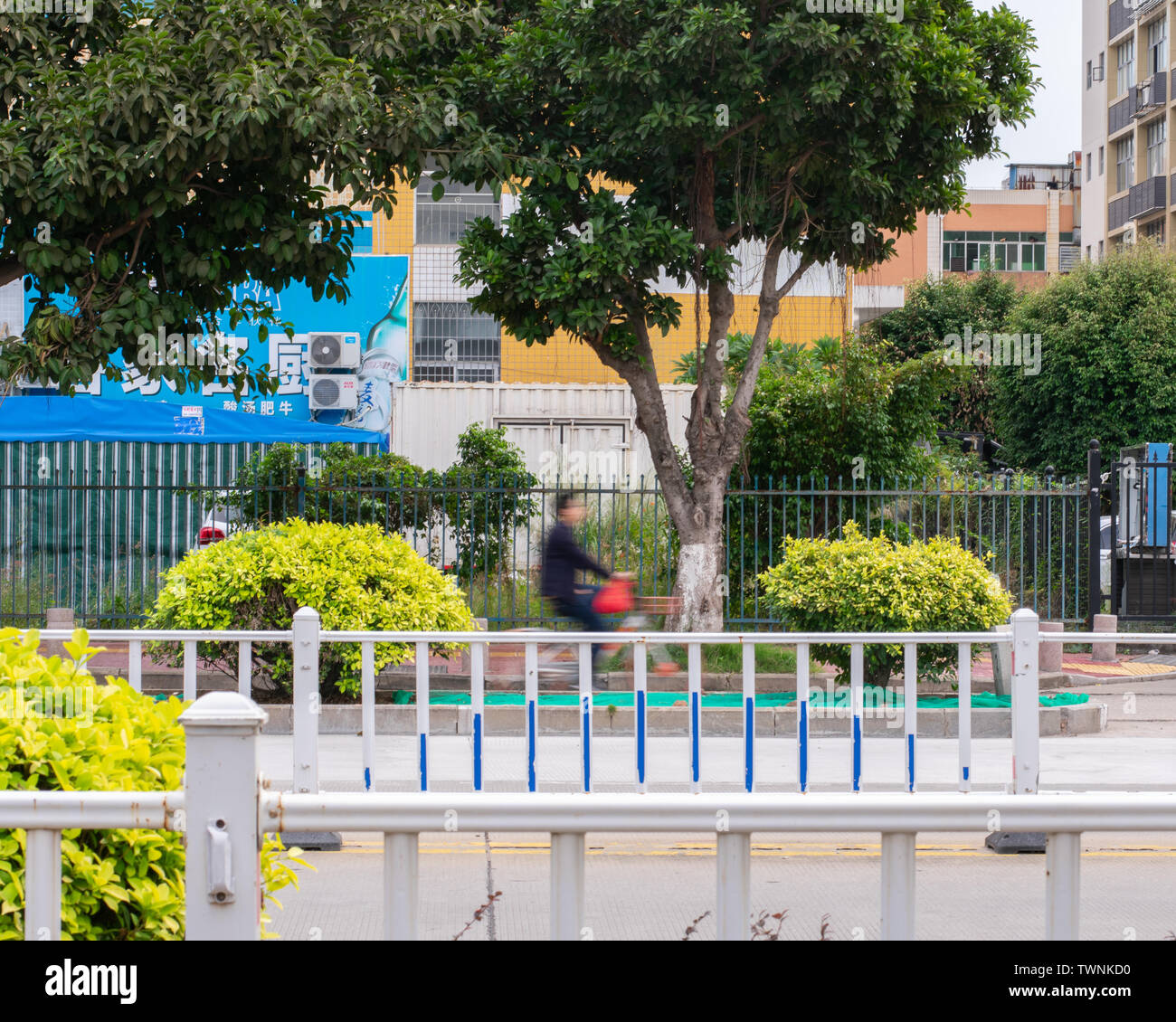 Rush hour commuters in downtown xiamen, china Stock Photo - Alamy