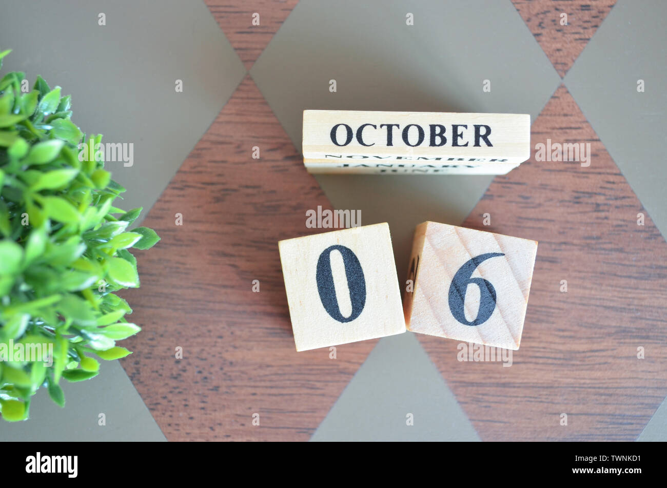 Date of October with leaf on diamond pattern table for background Stock ...