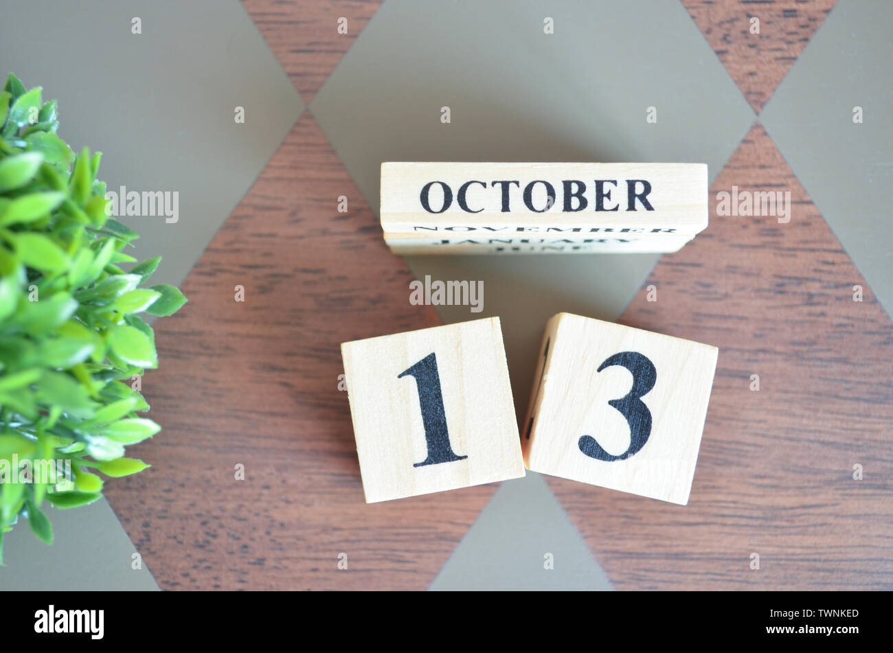 Date of October with leaf on diamond pattern table for background Stock ...