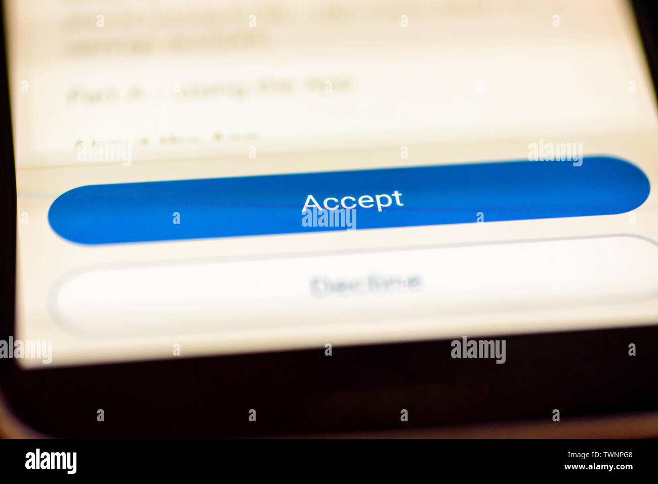 Accept button on smartphone app screen closeup Stock Photo - Alamy