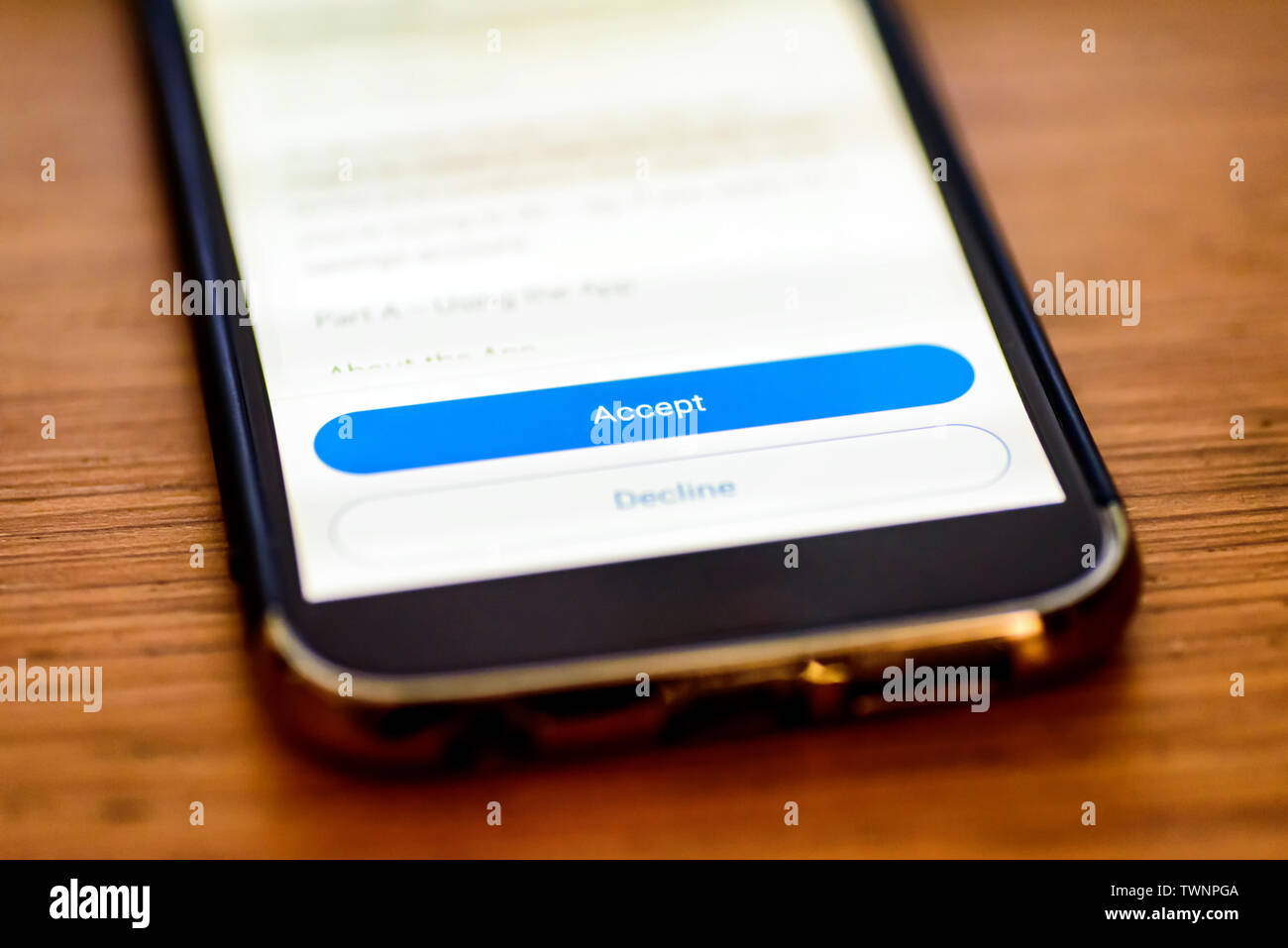 Accept button on smartphone app screen closeup Stock Photo - Alamy