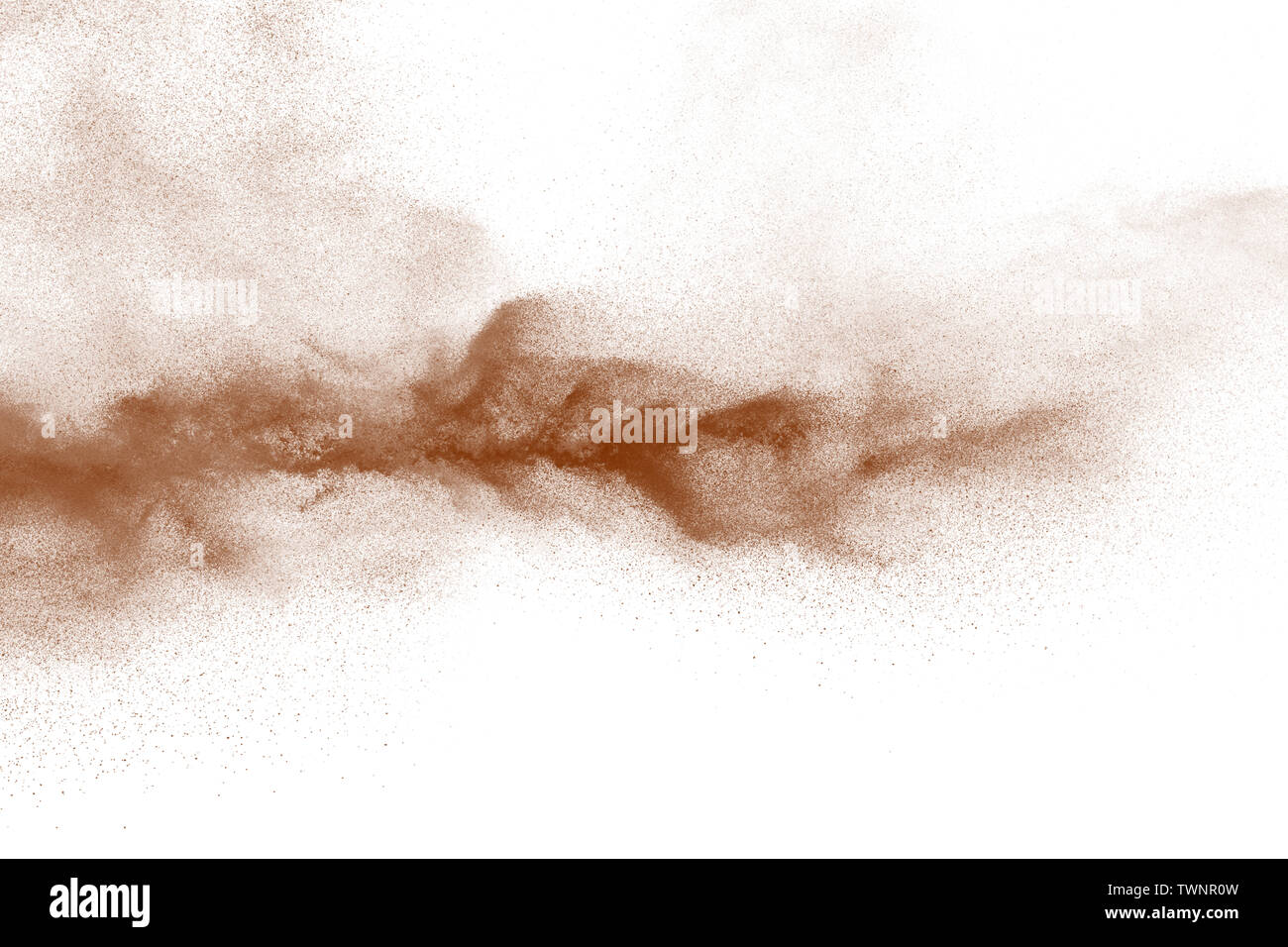 Explosion of deep brown powder on white background Stock Photo - Alamy