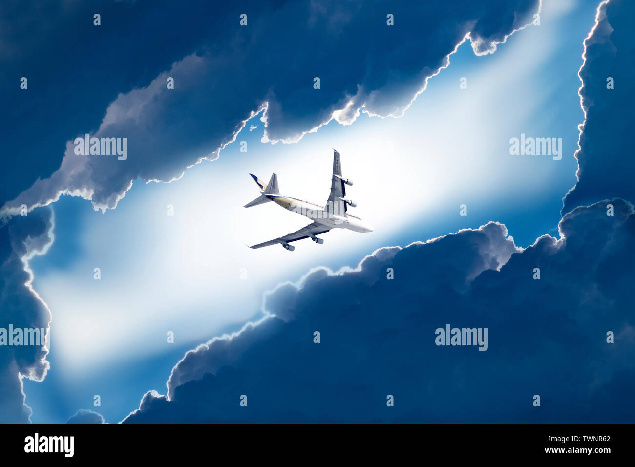 a plane airplane seen from below crosses a spectacular hole between the ...
