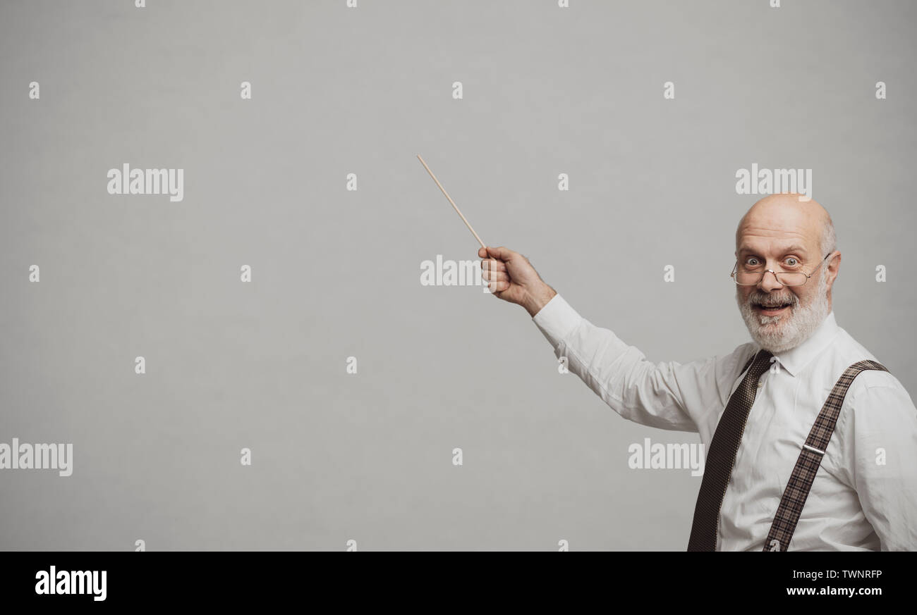 Cheerful funny academic professor smiling and pointing with a stick ...