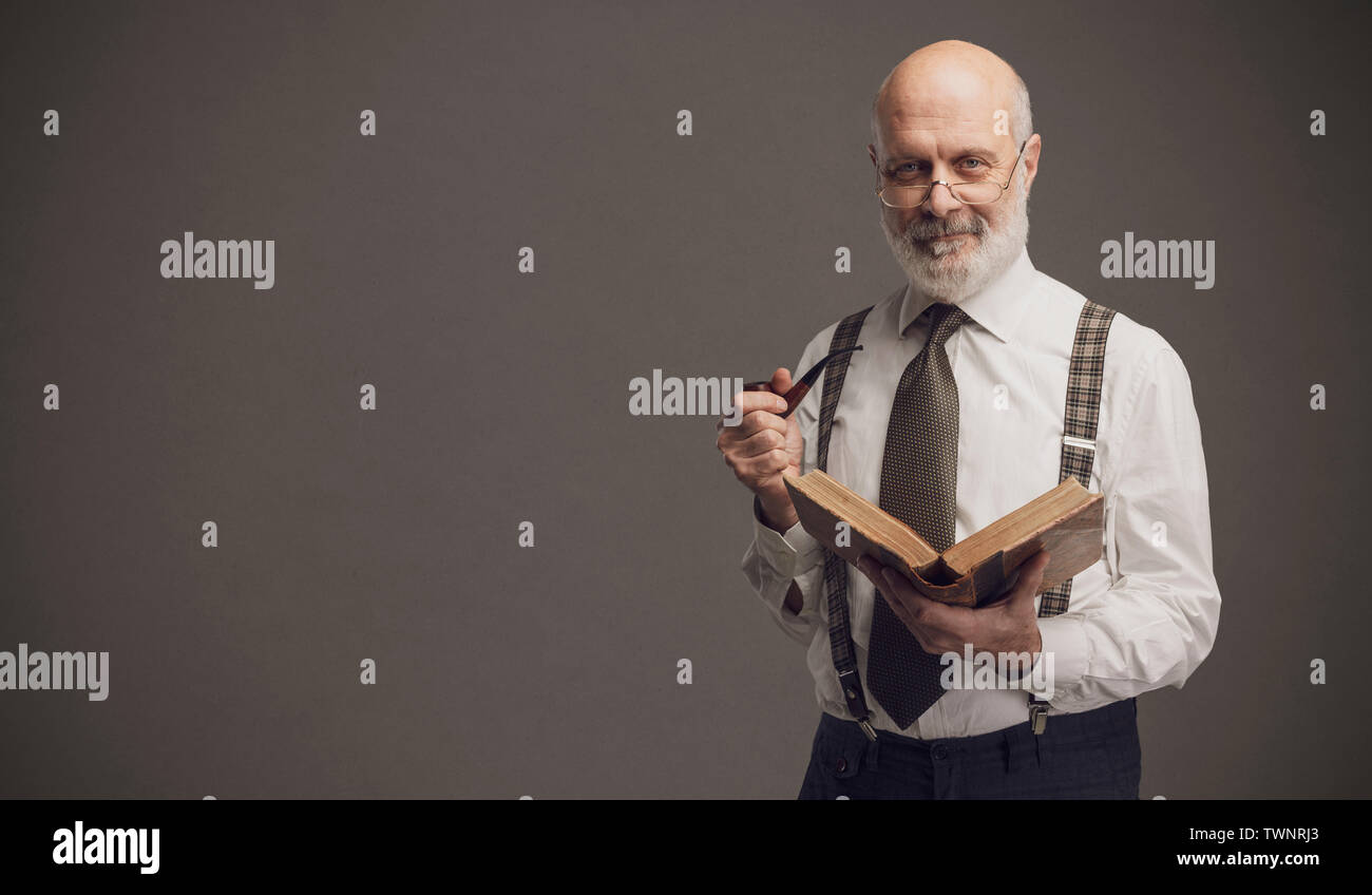 Reading a book and smoking pipe hi-res stock photography and images - Alamy