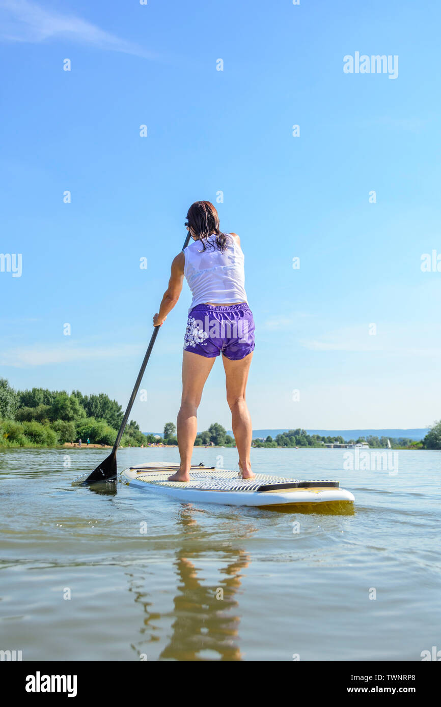 Sporty tourist woman standing hi-res stock photography and images - Alamy