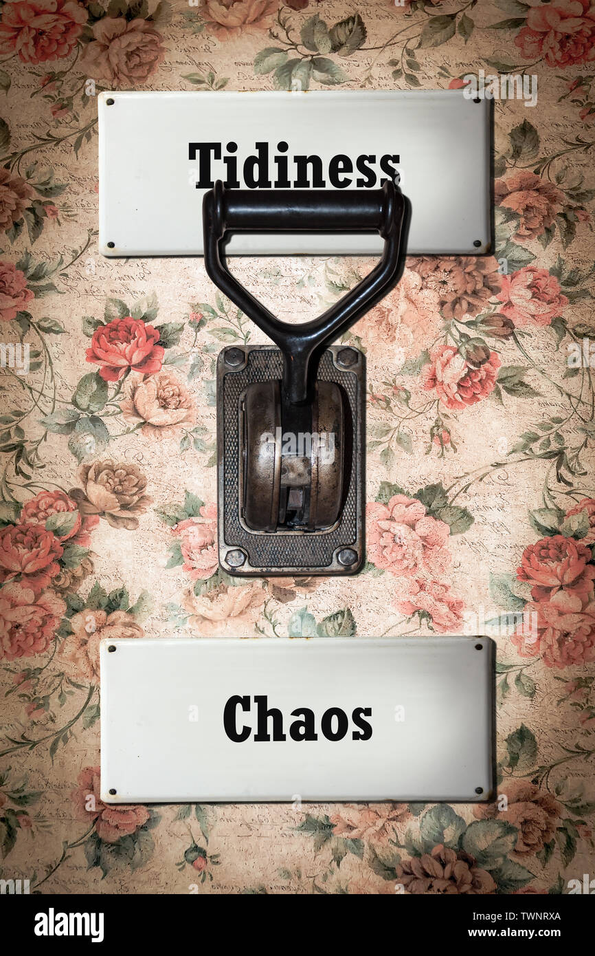 Street Sign the Direction Way to Tidiness versus Chaos Stock Photo - Alamy
