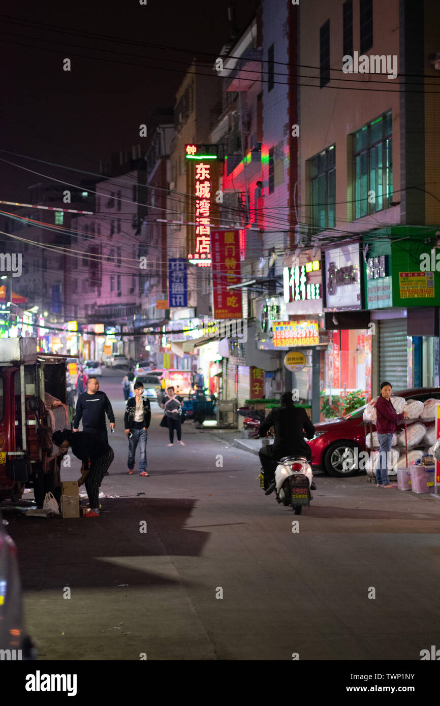 Busy city night life in downtown xiamen, china Stock Photo - Alamy