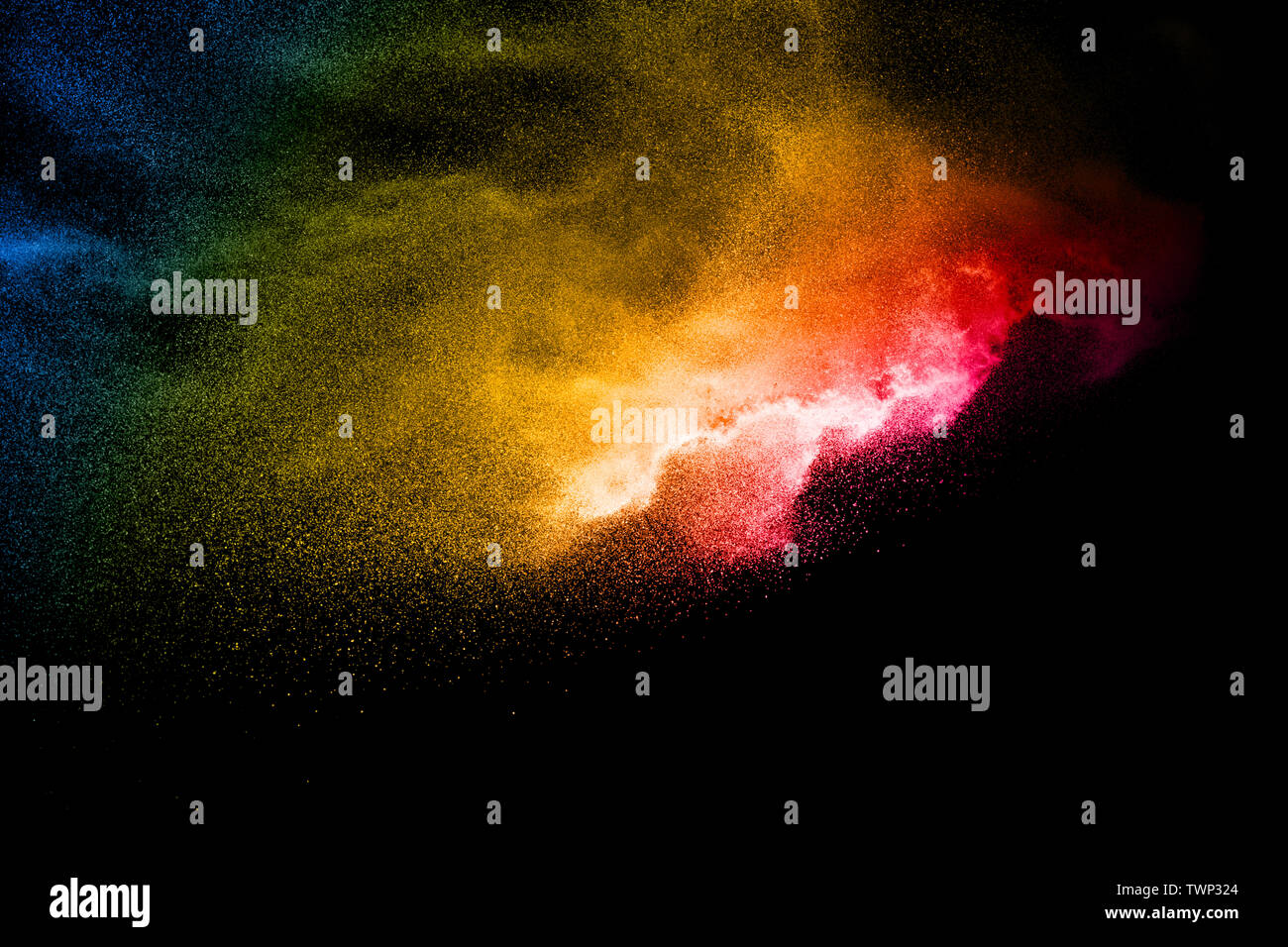 Vibrant color of powder explosion on black background Stock Photo - Alamy