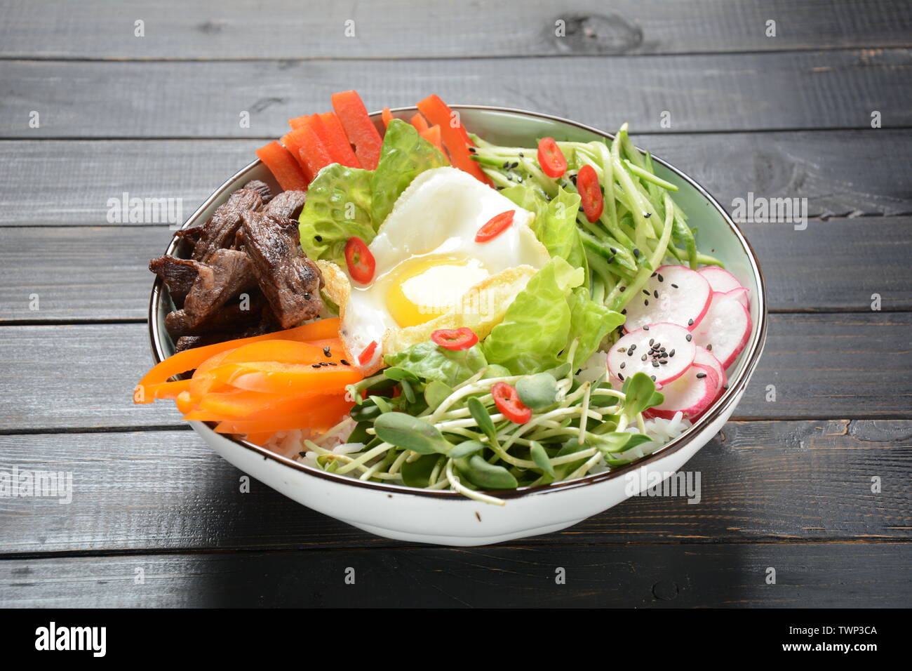 Bibimbub. Bibimbab.Fried egg beef and vegetables. Homemade traditional ...