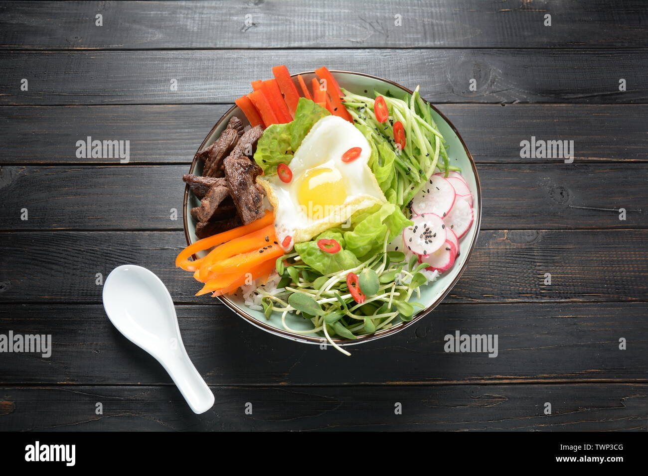 Bibimbub. Bibimbab.Fried egg beef and vegetables. Homemade traditional ...
