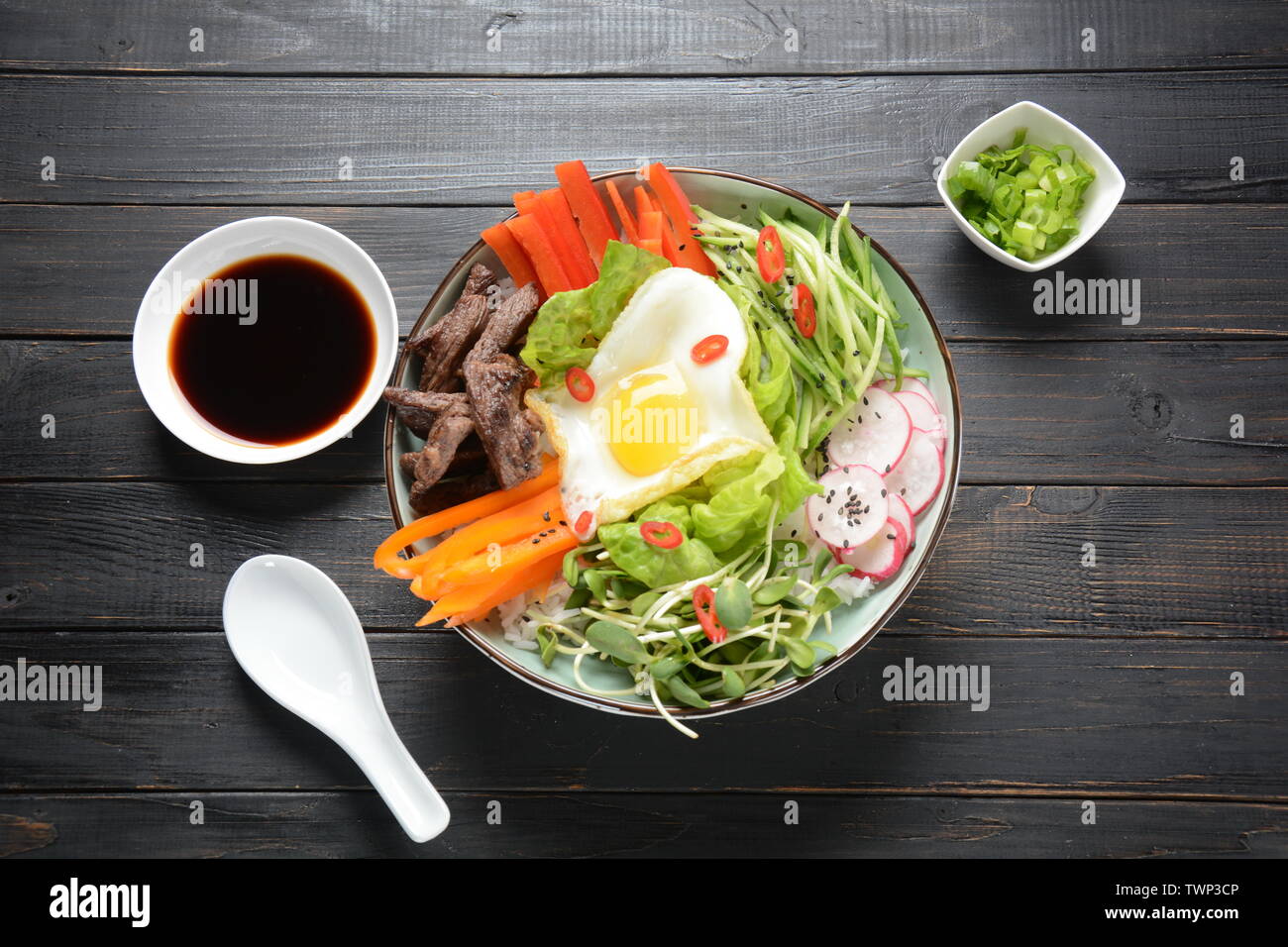 Bibimbub. Bibimbab.Fried egg beef and vegetables. Homemade traditional ...
