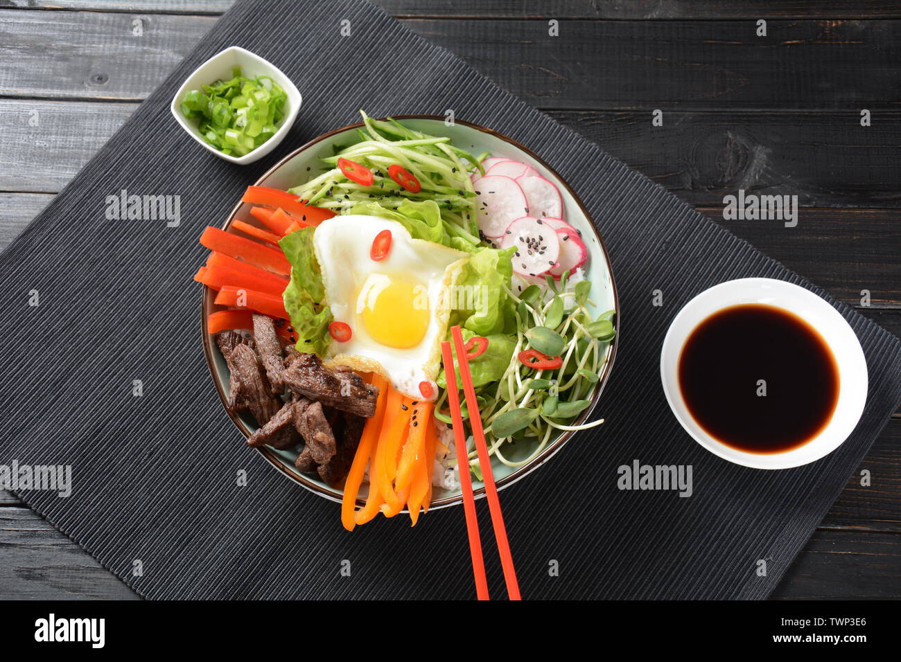 Bibimbub. Bibimbab.Fried egg beef and vegetables. Homemade traditional ...