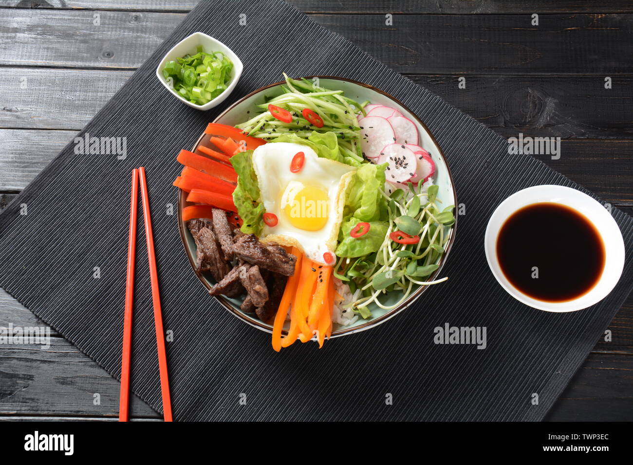 Bibimbub. Bibimbab.Fried egg beef and vegetables. Homemade traditional ...