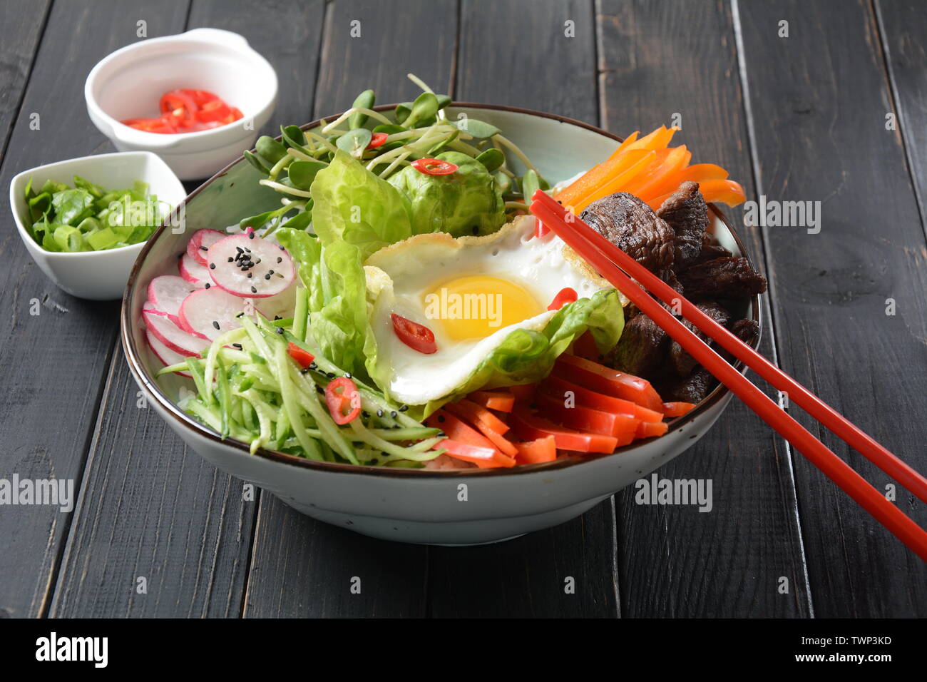 Bibimbub. Bibimbab.Fried egg beef and vegetables. Homemade traditional ...