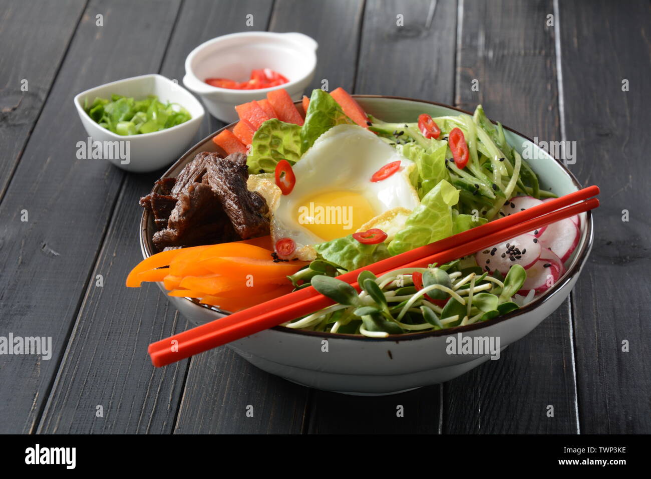 Bibimbub. Bibimbab.Fried egg beef and vegetables. Homemade traditional ...