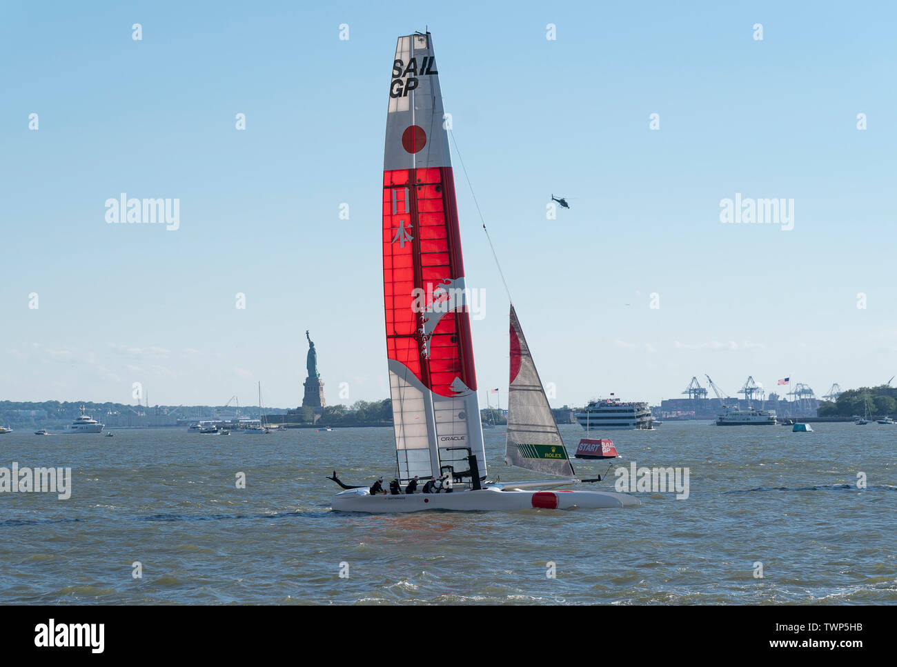 New York, United States. 21st June, 2019. SailGP Team Japan sails their ...