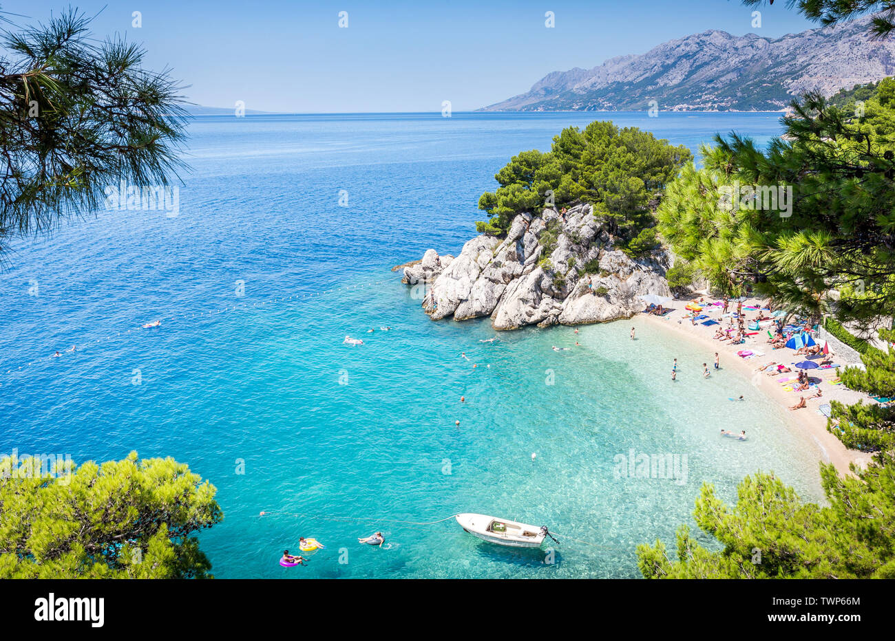 BRELA, CROATIA - JULY 20, 2018: Tourists relaxing on marvelous Brela ...