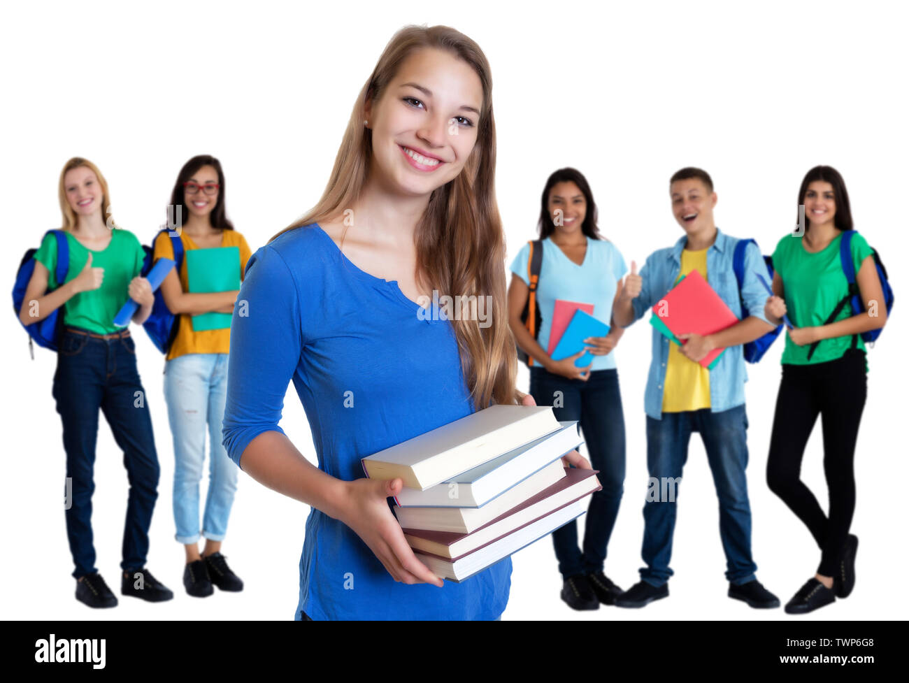 Blond german female student with books and group of students on an ...