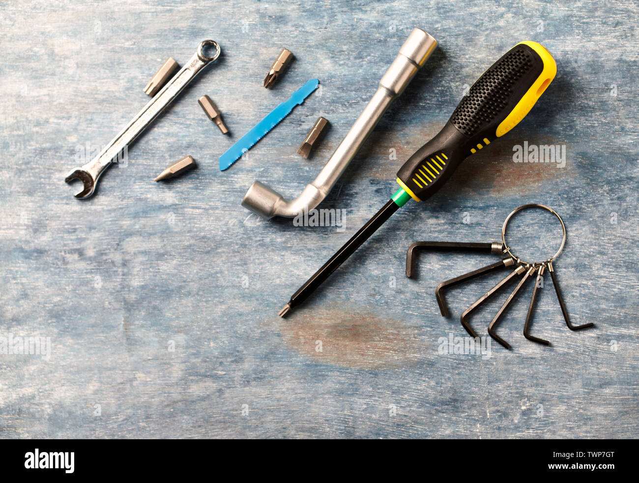 Screwdriver, hex keys, socket wrench and bits for a screwdriver on ...
