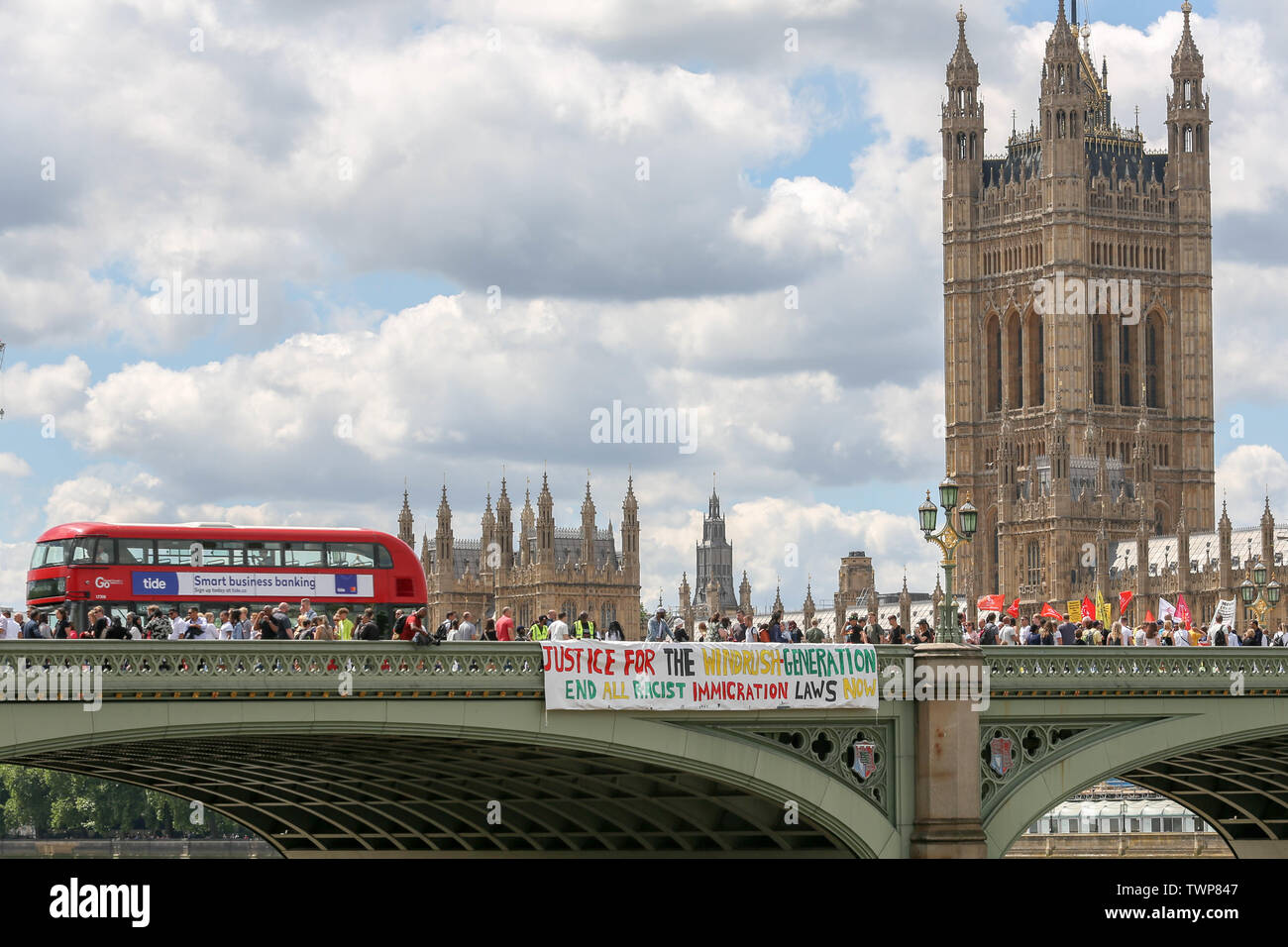 Westminster Bridge, London, UK. 22nd June, 2019. A banner drop from ...