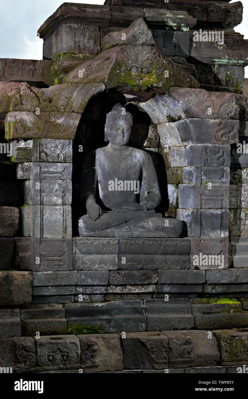 The Buddha statue in Borobudur. Borobudur is a 9th-century Mahayana ...