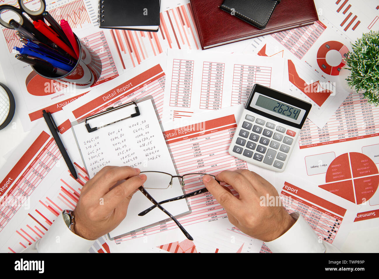 Business reports, data tables and charts - directly above view of ...