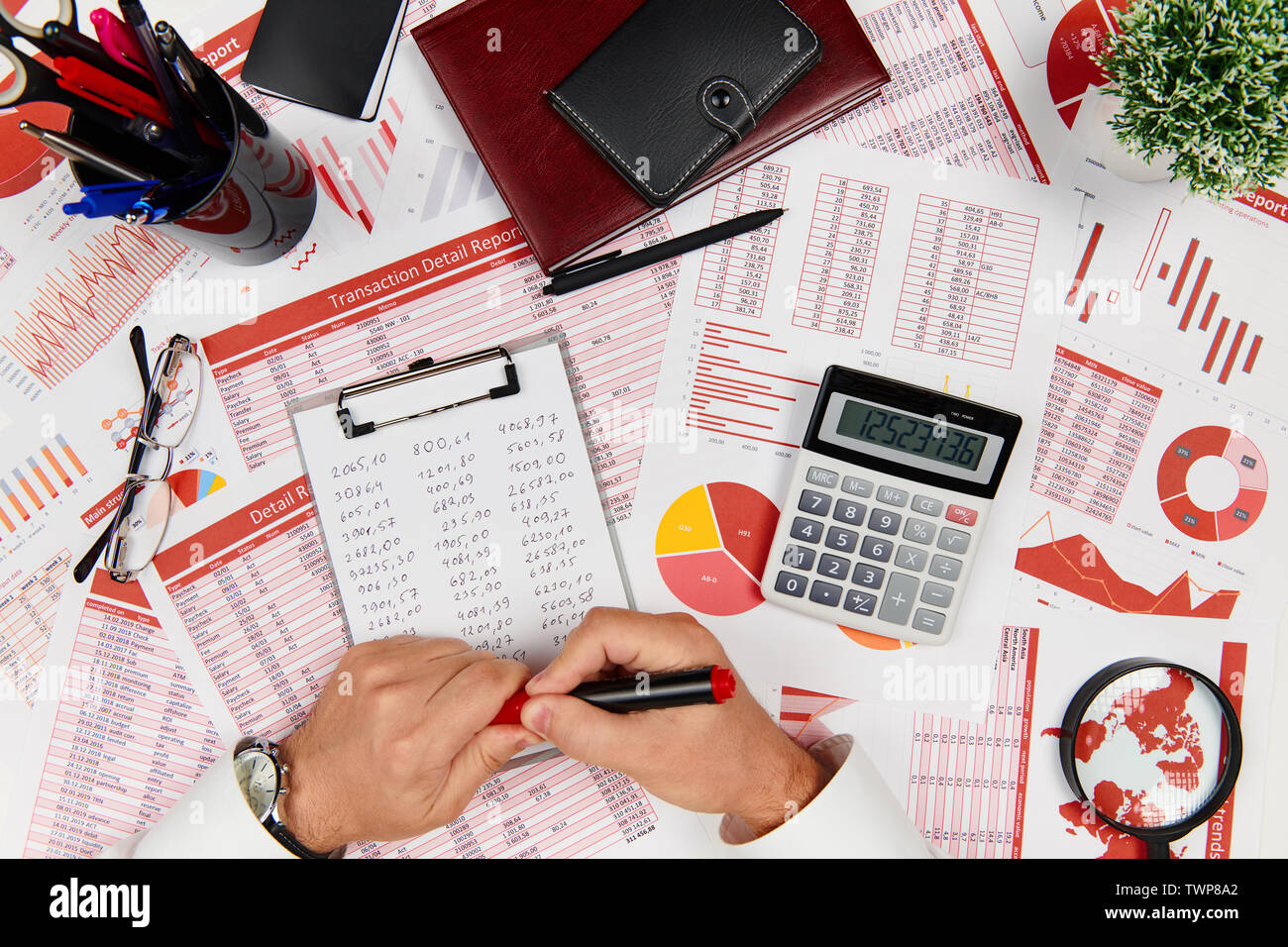 Business reports, data tables and charts - directly above view of ...