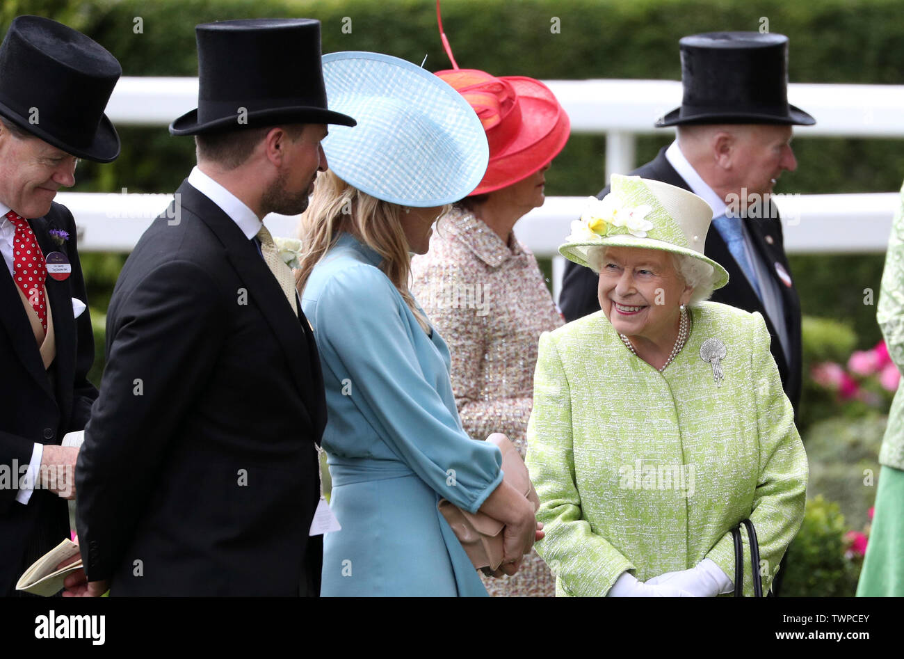 Queen Elizabeth II (right) Autumn Phillips (centre) and Peter Phillips ...