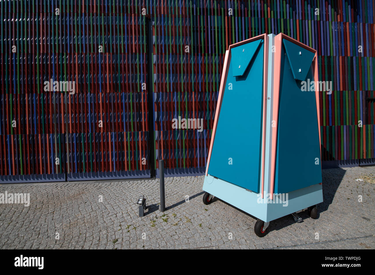 Portable object by wall Stock Photo - Alamy