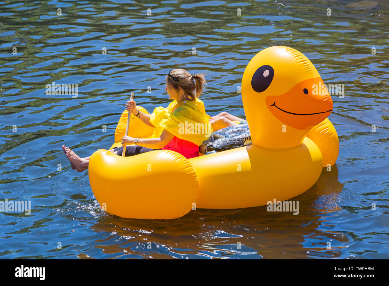 Yellow duck poncho hi-res stock photography and images - Alamy