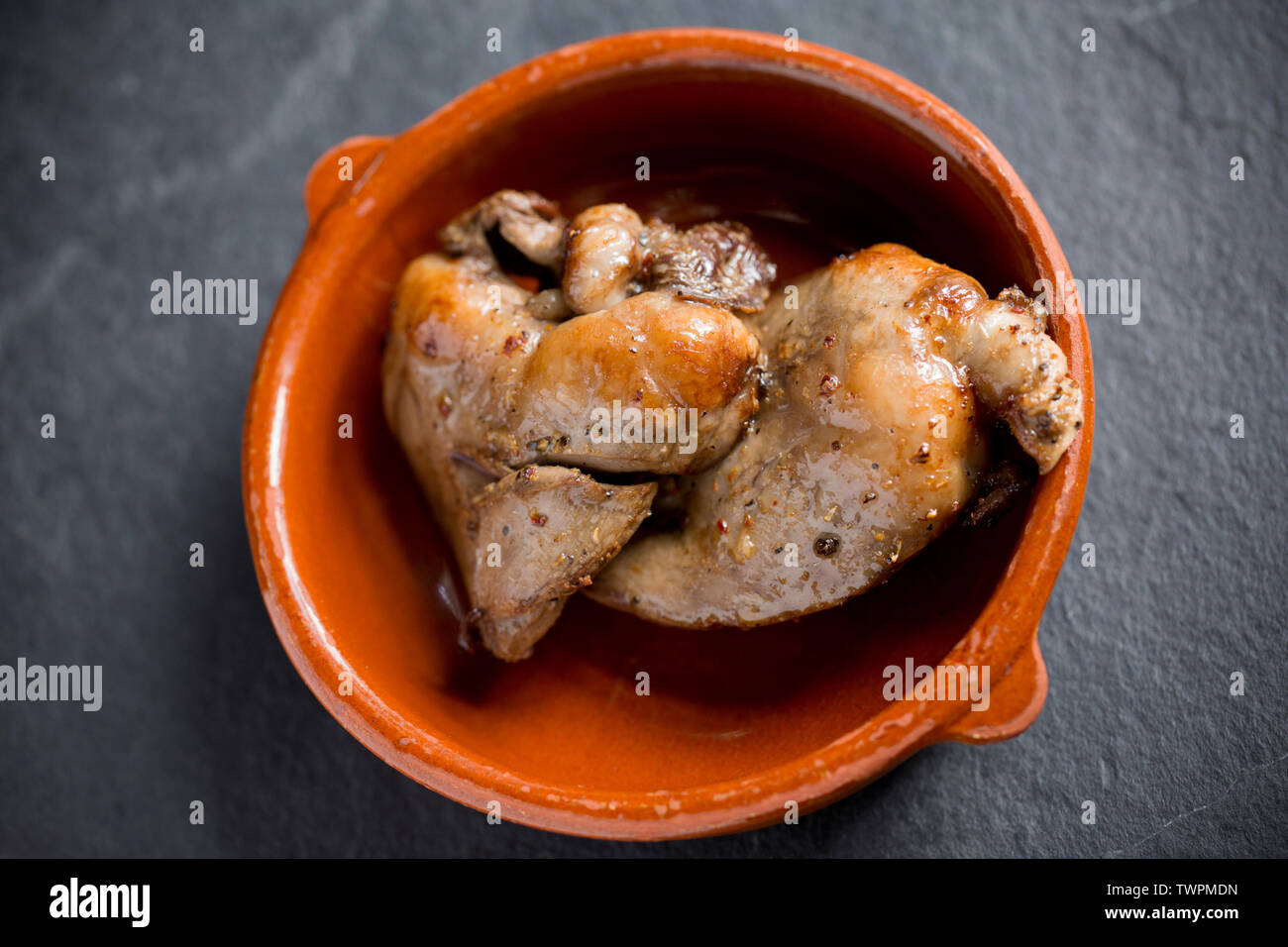 Two grilled halves of a British lamb’s heart that have been cooked in a ...