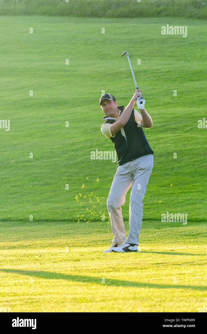 Summer afternoon man playing golf hi-res stock photography and images ...