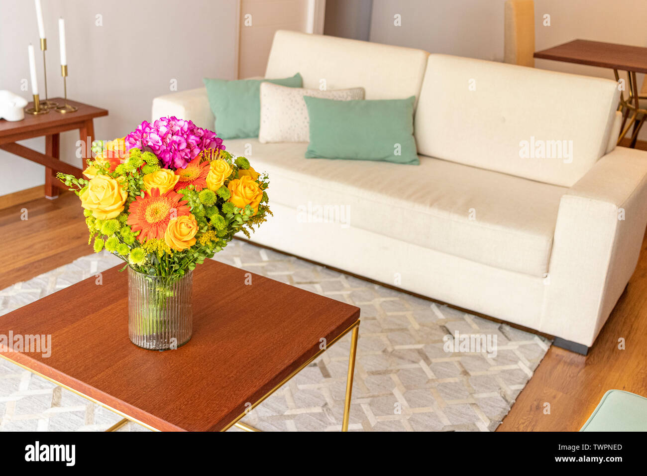 Floral arrangement of roses and carnations decorating the living room ...