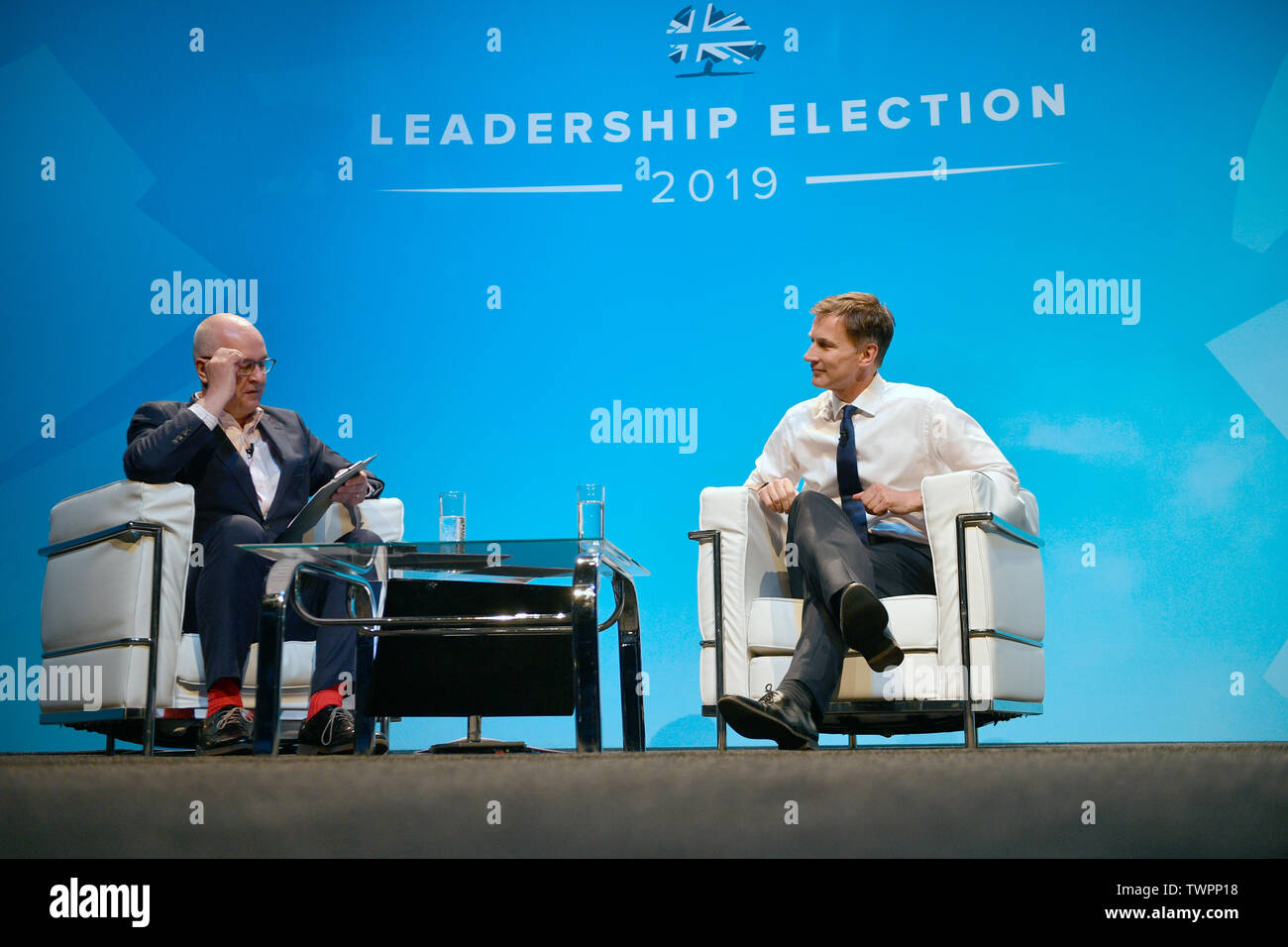 Conservative party leadership candidate Jeremy Hunt with moderator Iain ...
